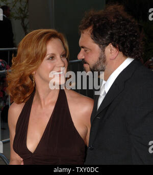 Elizabeth Perkins with husband Julio Macat and daughter arriving at the ...