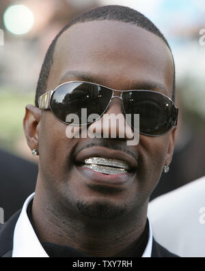 Jordan "Juicy J" Houston shows off his watch at the 78th Annual Academy ...