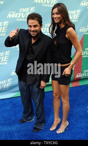 Director Brett Ratner and his girlfriend Alina Pusau arrive for the ...
