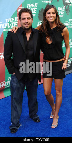 Director Brett Ratner and his girlfriend Alina Pusau arrive for the ...