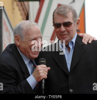 Producer Alan Ladd Jr. (R) shares a light moment with actor/director ...