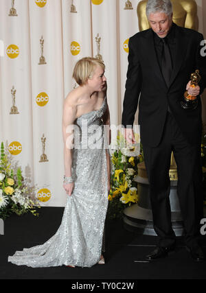 Christopher Rouse poses with his Oscar for Achievement in Film Editing ...