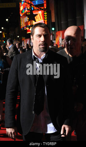 Actor John Travolta, who voices the character Bolt in the animated film ...