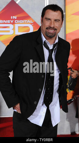 Actor John Travolta, who voices the character Bolt in the animated film ...