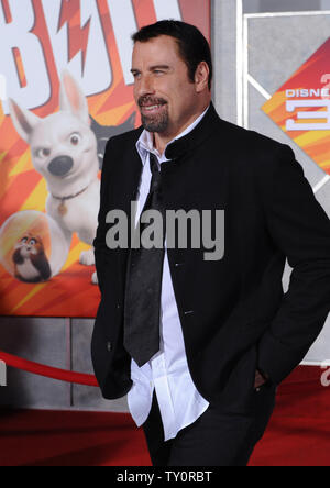 Actor John Travolta, who voices the character Bolt in the animated film ...