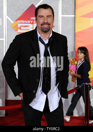 Actor John Travolta, who voices the character Bolt in the animated film ...