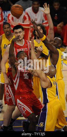 Houston Rockets' Ron Artest (96) talks to referee Phil Robinson (11 ...