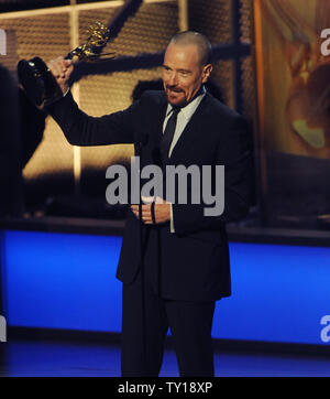 Bryan Cranston accepts the award for Best Actor for "Trumbo" at the ...