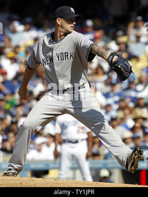 Los Angeles Dodgers starting pitcher Shohei Ohtani delivers during the ...