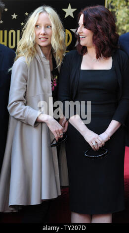 Alec Baldwin and Megan Mullally Alec Baldwin Hollywood Walk Of Fame ...