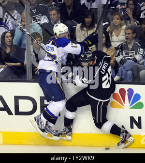 Los Angeles Kings center Trevor Lewis (61) is congratulated at the ...