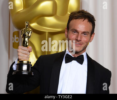 Chris Terrio holds his Oscar for Adapted Screenplay for "Argo" backstage at the 85th Academy ...
