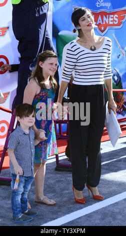 Catherine Bell, daughter Gemma and son Ronan attending PlayStation's ...