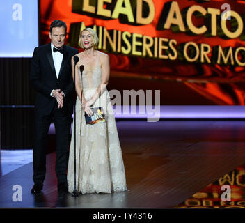 Actor Bryan Cranston (L) and actress Claire Danes speak onstage during ...