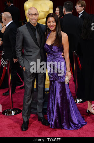 Screenwriter John Ridley (L) and Gayle Ridley arrive on the red carpet ...