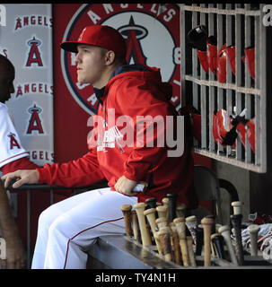 Los Angeles Angels' Mike Trout, left, slides safely into home plate as ...