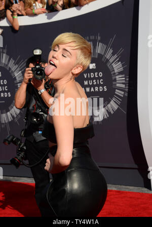 Musician Miley Cyrus arrives at the 2014 MTV Video Music Awards at the ...