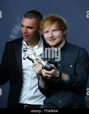Emil Nava, left, and Ed Sheeran pose with the award for Best Male Video ...