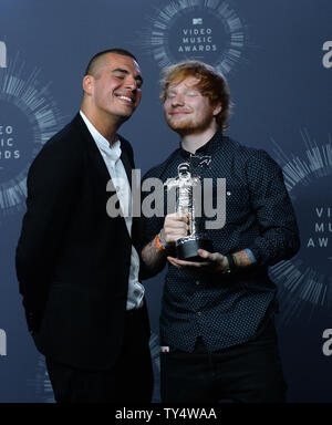 Emil Nava, left, and Ed Sheeran pose with the award for Best Male Video ...