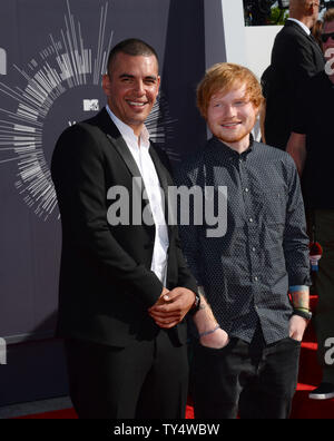 Emil Nava, left, and Ed Sheeran pose with the award for Best Male Video ...