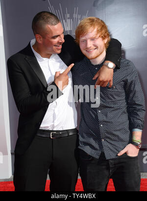 Emil Nava, left, and Ed Sheeran pose with the award for Best Male Video ...