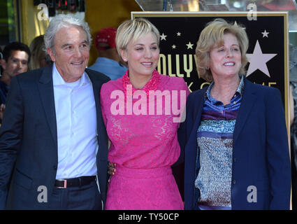 Actress Kaley Cuoco (C) poses with her father Gary Carmine Cuoco and ...