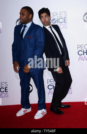 Actor Anthony Anderson, left, and actor Adrian Grenier arrive for the ...