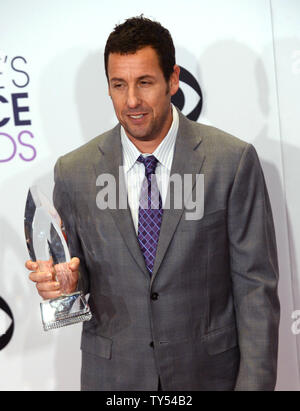 Actor Adam Sandler poses backstage after an appearance on MTV's "Total ...