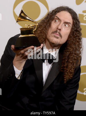 "Weird Al" Yankovic poses in the press room with the award for best ...
