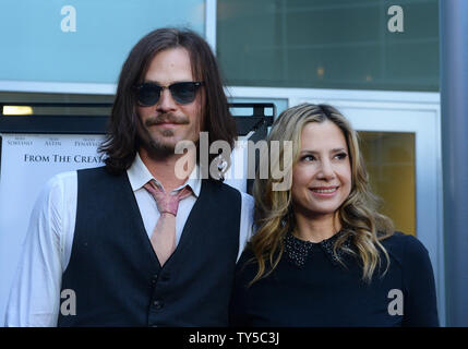 Cast member Mira Sorvino and her husband, actor Christopher Backus ...
