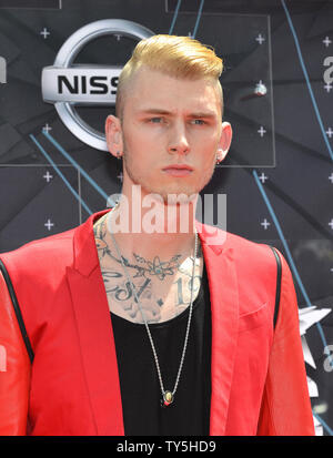 Musician Machine Gun Kelly attends the 15th annual BET Awards at ...