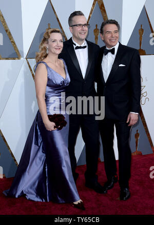 Sian Grigg, from left, Duncan Jarman and Robert A. Pandini arrive at ...