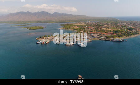 Aerial view ferry port gilimanuk with ferry boats, vehicles. Ferries ...