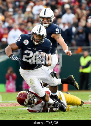 Penn State running back Saquon Barkley takes a snap during NCAA college ...