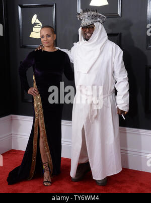 Carlon Thompson-Clinton (L) and musician George Clinton arrive for the ...