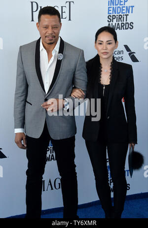 Terrence Howard and Miranda Pak attend the premiere of Peacock's "Fight ...