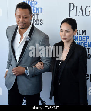 Terrence Howard and Miranda Pak attend the premiere of Peacock's "Fight ...
