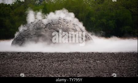 mud volcano with bursting bubble bledug kuwu. volcanic plateau with ...