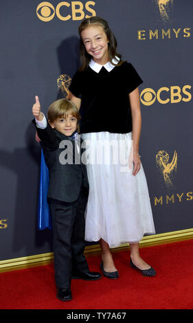 Aubrey Anderson-Emmons (R) and Jeremy Maguire at the 69th Annual Emmy ...