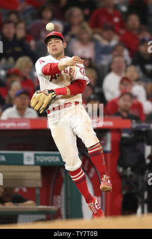 Los Angeles Angels shortstop David Fletcher catches a pop hit by ...