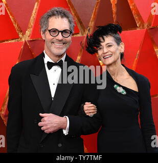 Production designer Dennis Gassner (L) and guest arrive on the red ...