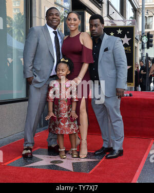 Actor Tracy Morgan (L) is joined by his wife Megan Wollover and their ...