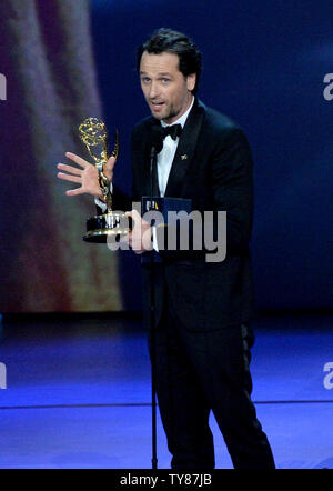 Matthew Rhys accepts the award for outstanding lead actor in a drama ...