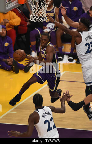 Los Angeles Lakers guard Rajon Rondo (9) makes a pass under pressure ...