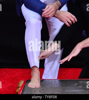 American rapper Armando Christian Perez, right, better known by his ...