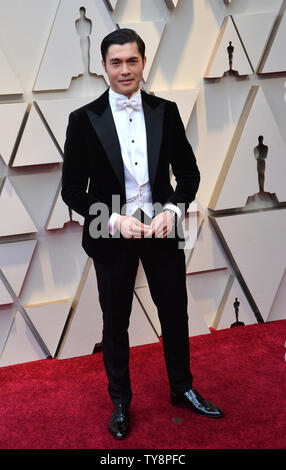 Henry Golding arrives at the Oscars on Sunday, Feb. 24, 2019, at the ...