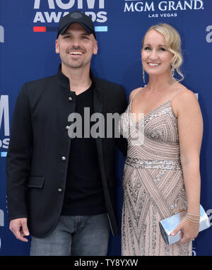 Jon Nite (L) and guest attend the 54th annual Academy of Country Music ...