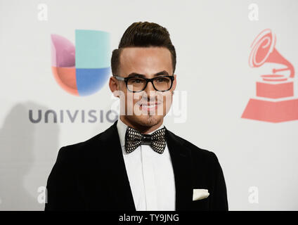 Johnny Sky poses backstage during the 16th Annual Latin Grammy Awards ...