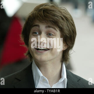 Actor Daniel Radcliffe poses at the premiere of "Kill Your Darlings ...