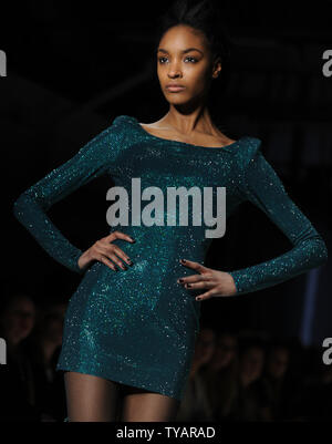 Model Jourdan Dunn walks on the runway during the La Perla Fashion Show ...